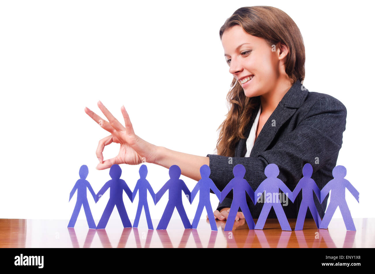 Woman with paper cut people Stock Photo - Alamy