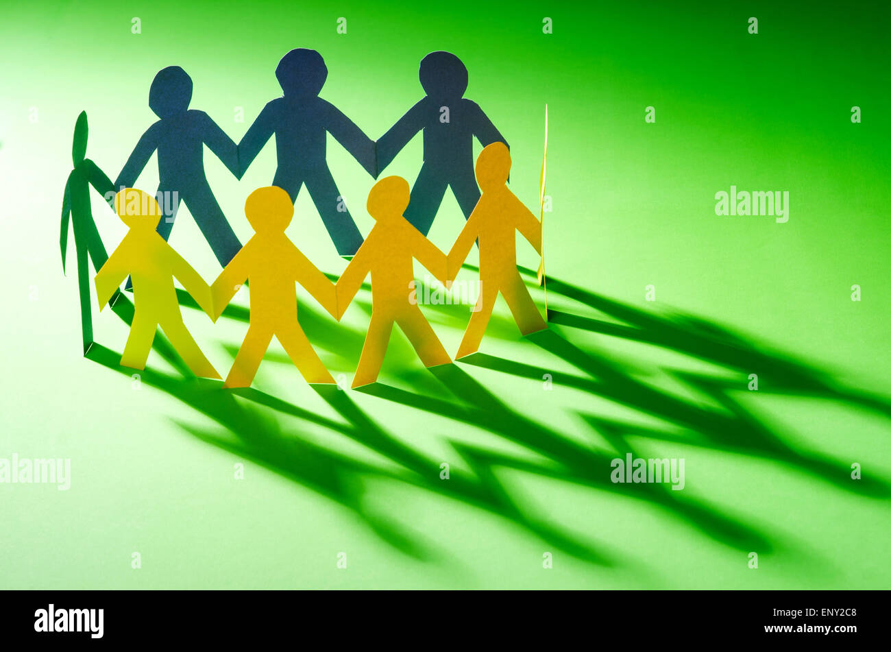 Paper people in teamworking concept Stock Photo - Alamy