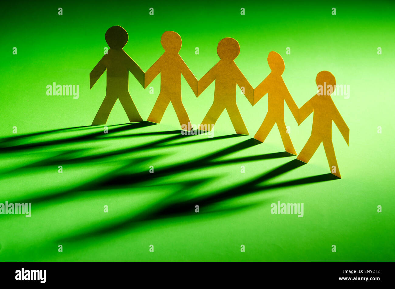 Paper people in teamworking concept Stock Photo - Alamy