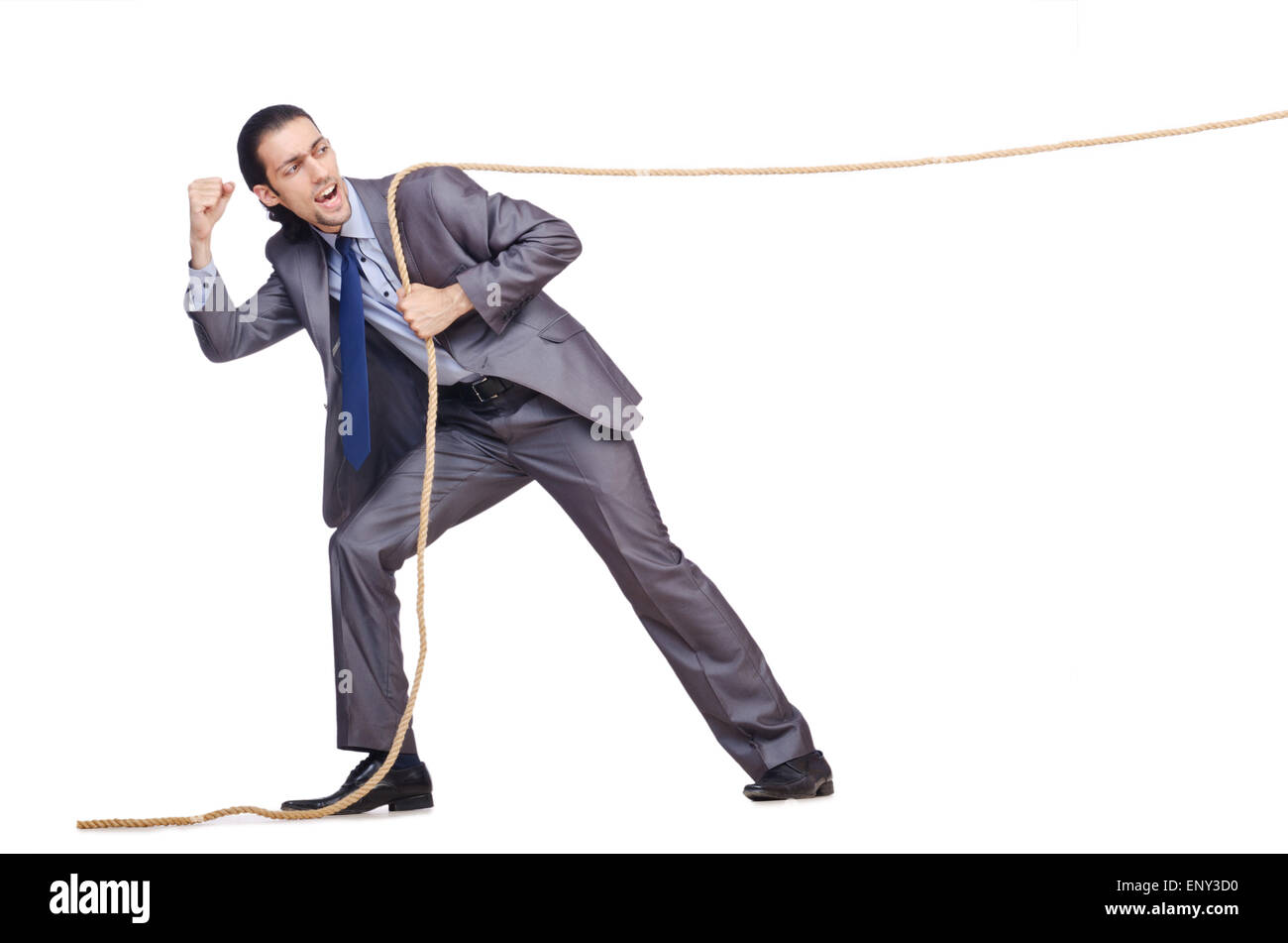 Businessman pulling rope on white Stock Photo - Alamy