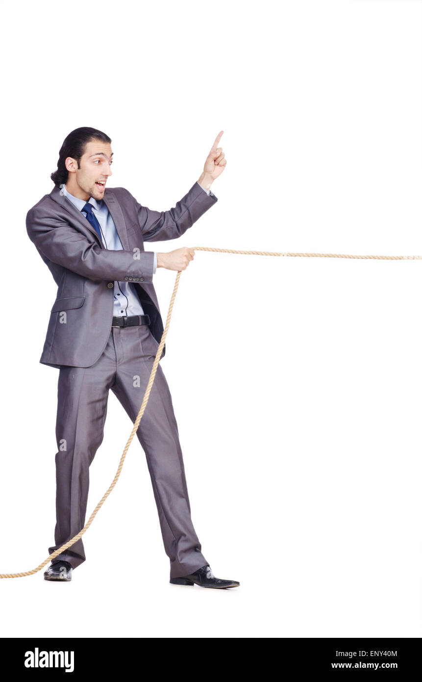 Businessman pulling rope on white Stock Photo - Alamy