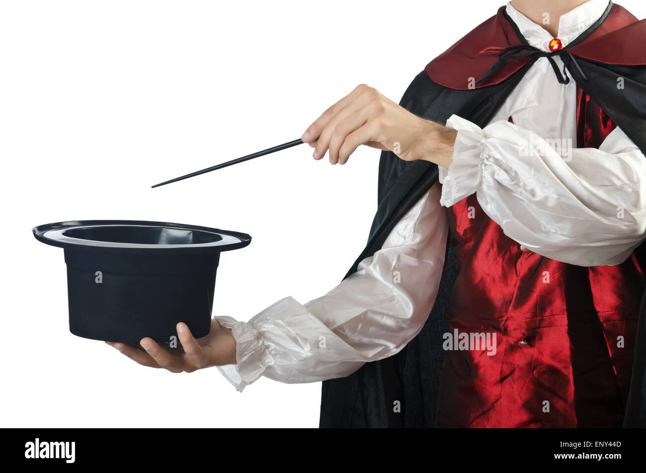 Magician doing tricks on white Stock Photo - Alamy