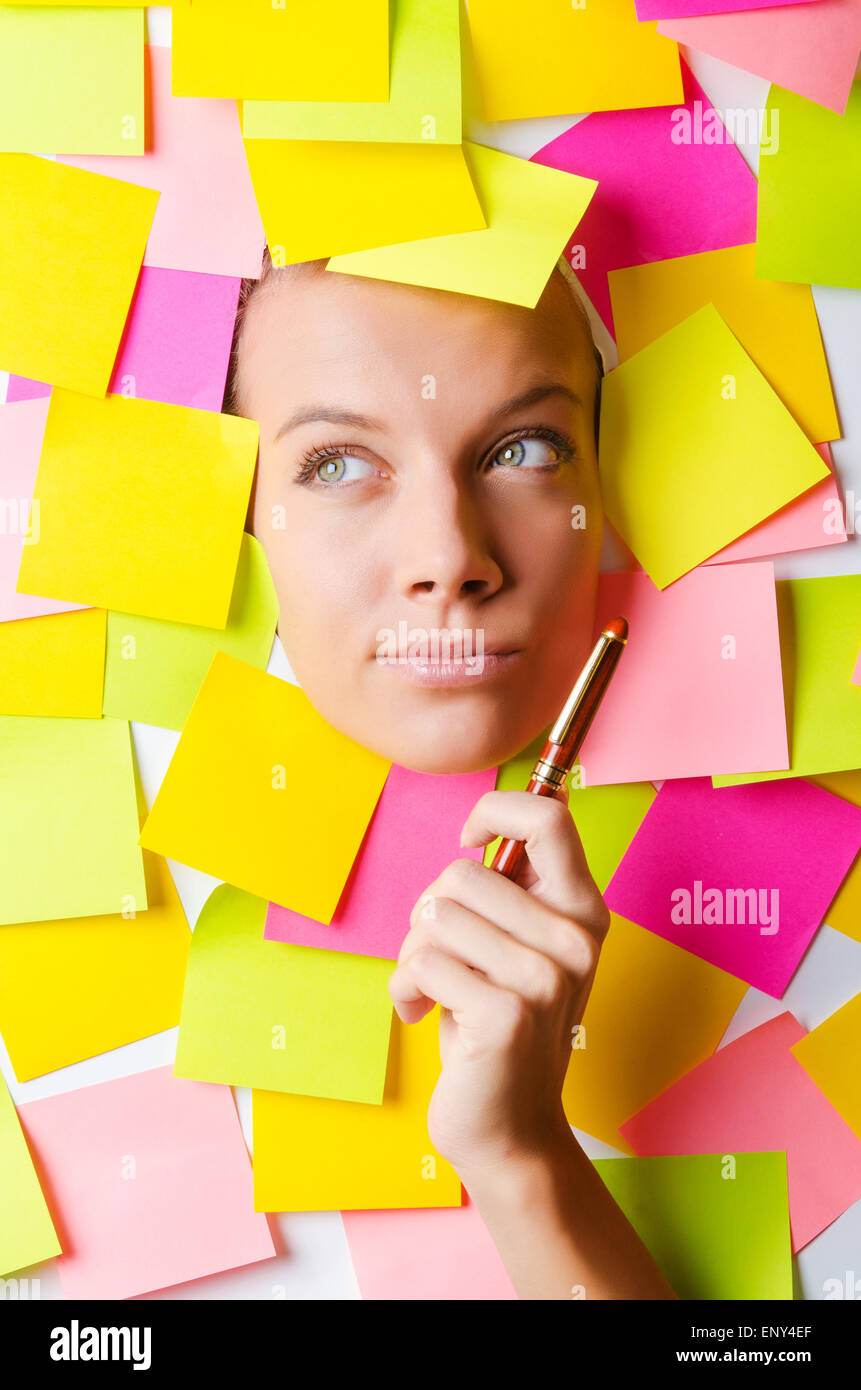 Woman with lots of reminder notes Stock Photo - Alamy