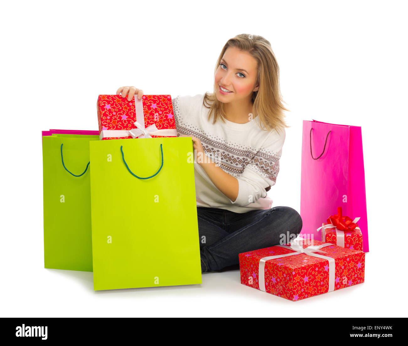 Young girl with bags and gift boxes isolated Stock Photo - Alamy