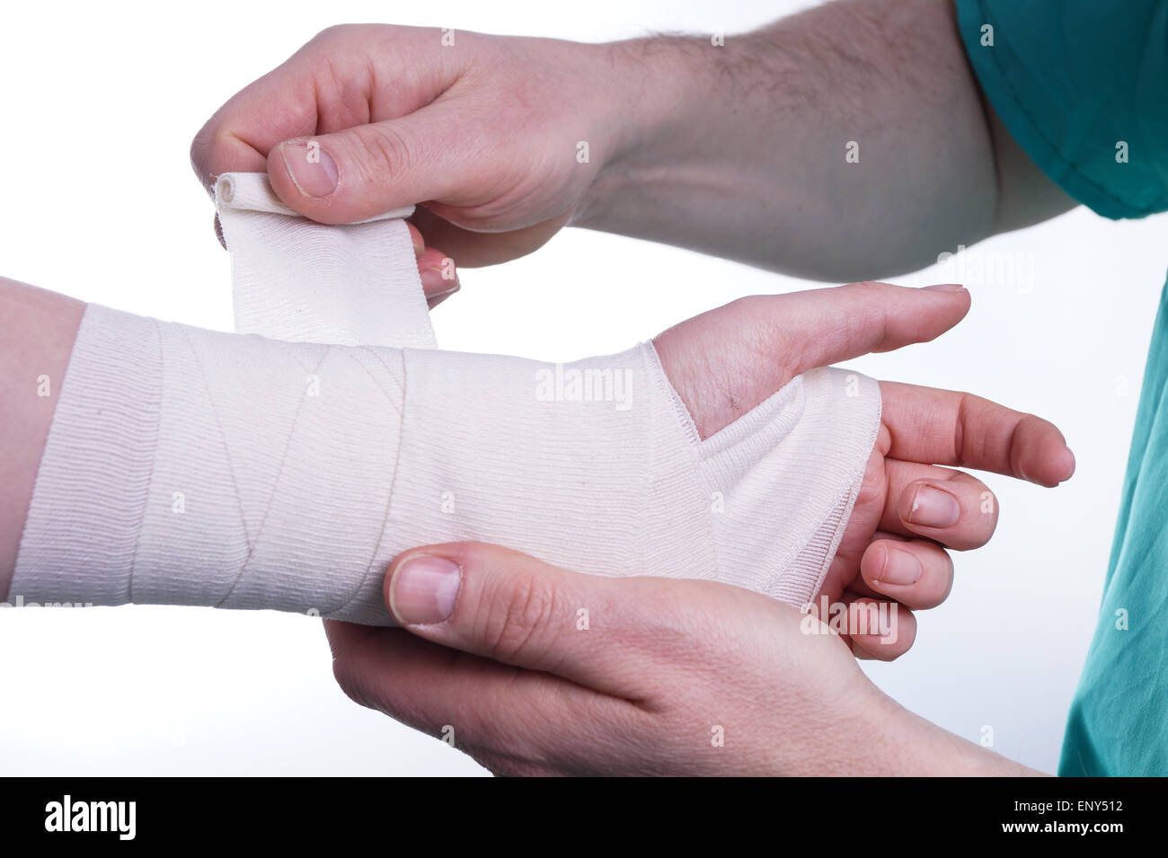 Sprained hand, Doctor helping with the Bandage Stock Photo - Alamy