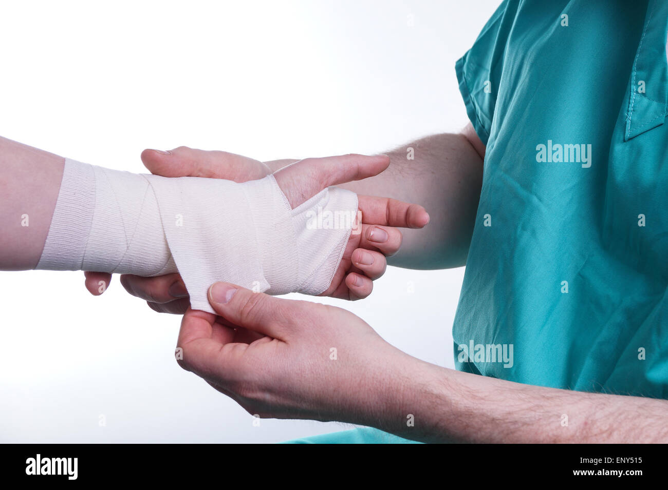 Sprained hand, Doctor helping with the Bandage Stock Photo - Alamy