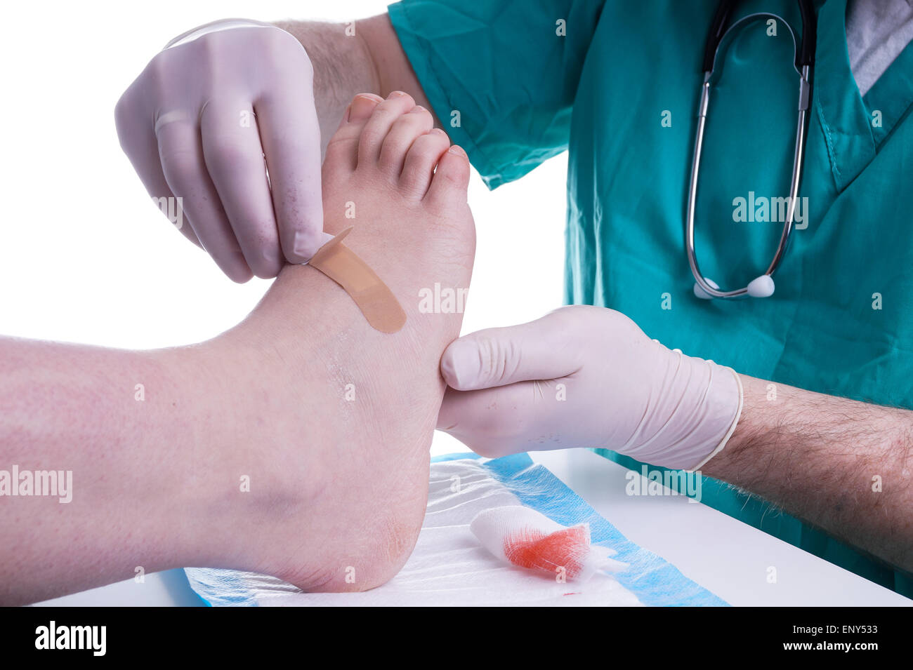 Adhesive Bandage. Bandaging at Wound by the Doctor Stock Photo - Alamy
