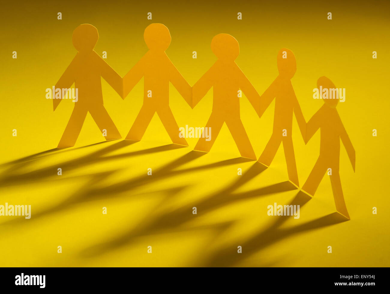 Paper people in teamworking concept Stock Photo - Alamy