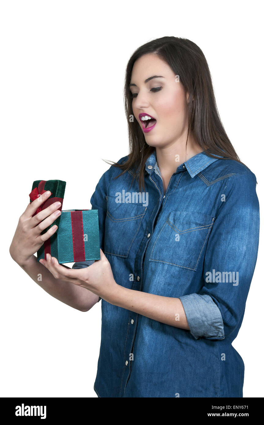 Beautiful woman opening a present Stock Photo - Alamy