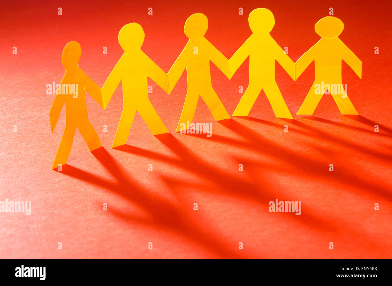 Paper people in teamworking concept Stock Photo - Alamy