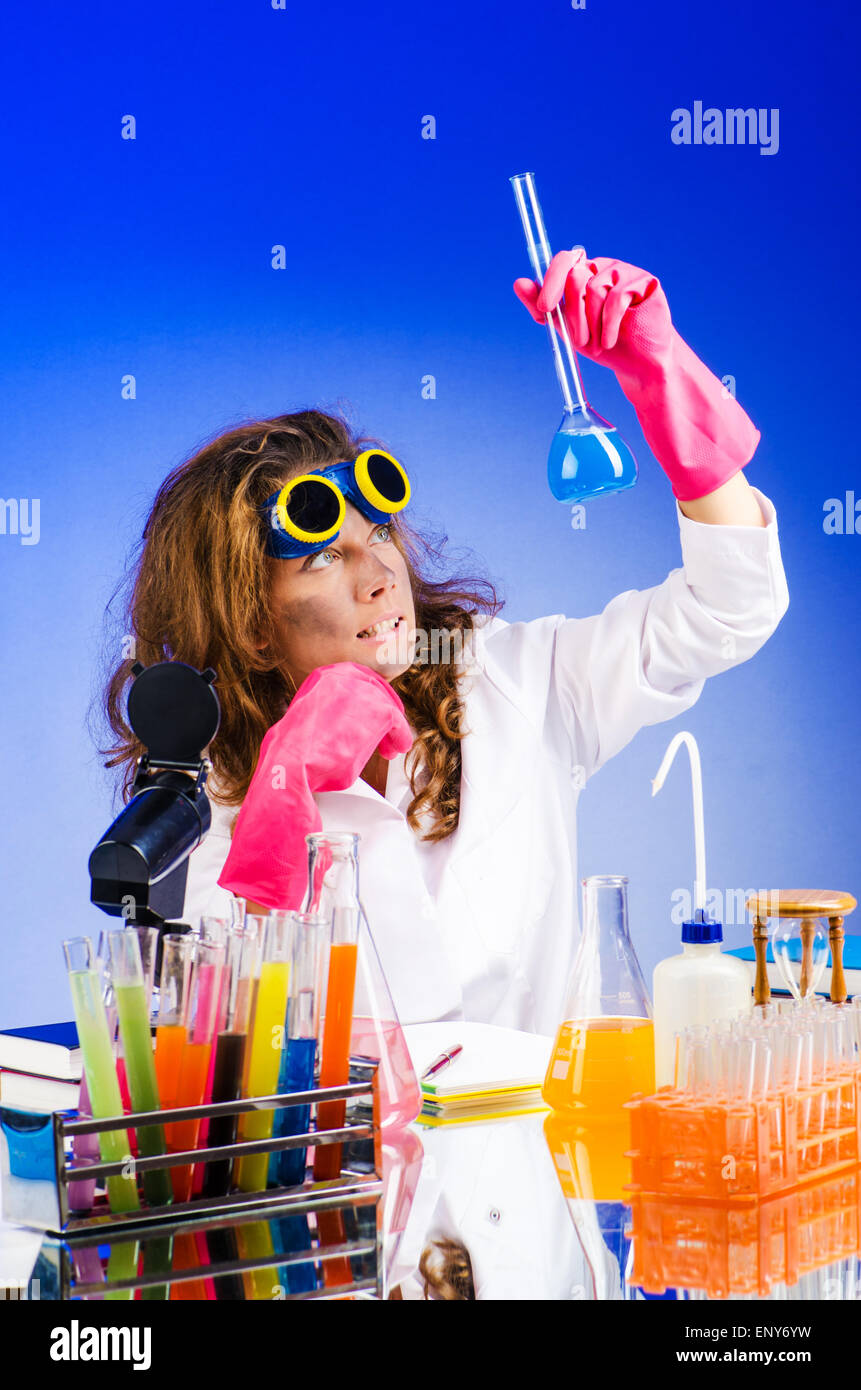 Funny female chemist in lab Stock Photo - Alamy