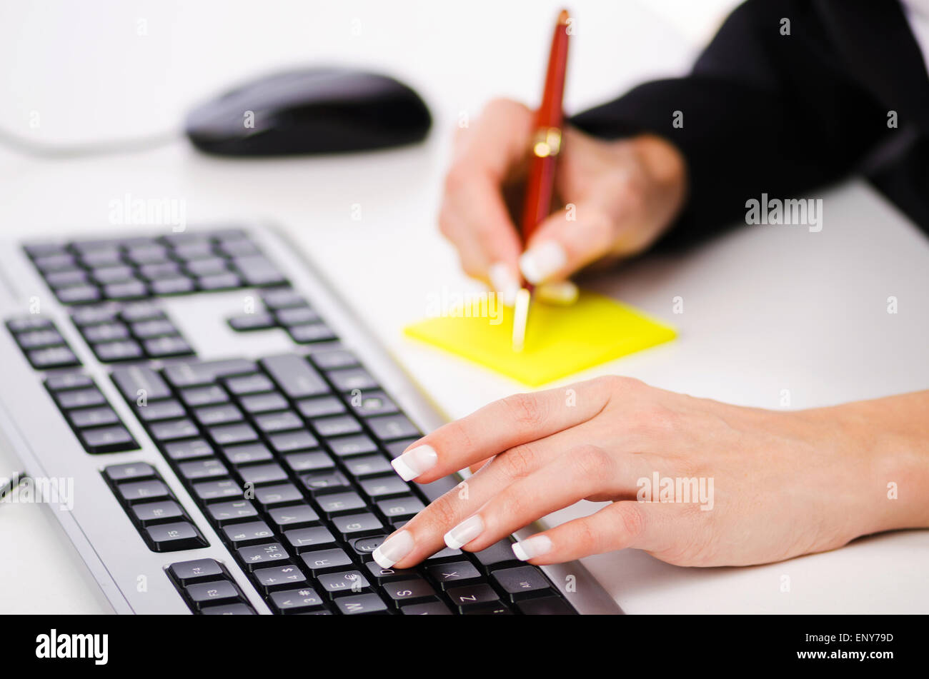 Hands working on the keyboard Stock Photo - Alamy