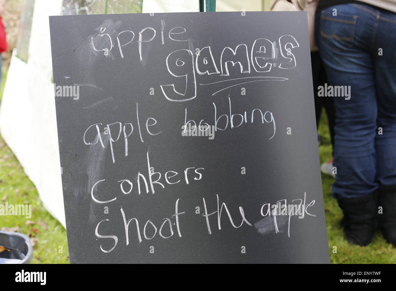 Apple bobbing and games notice - Chalk sign on blackboard at country ...