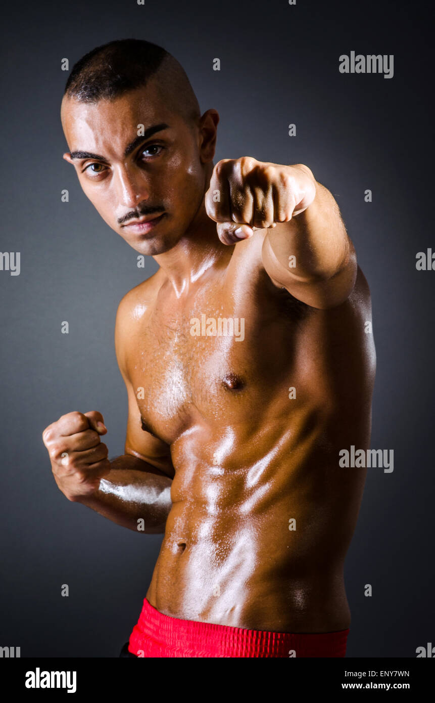 Muscular boxer in dark studio Stock Photo - Alamy