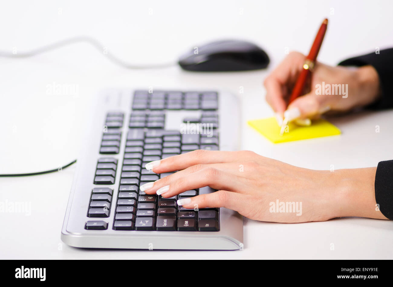 Hands working on the keyboard Stock Photo - Alamy