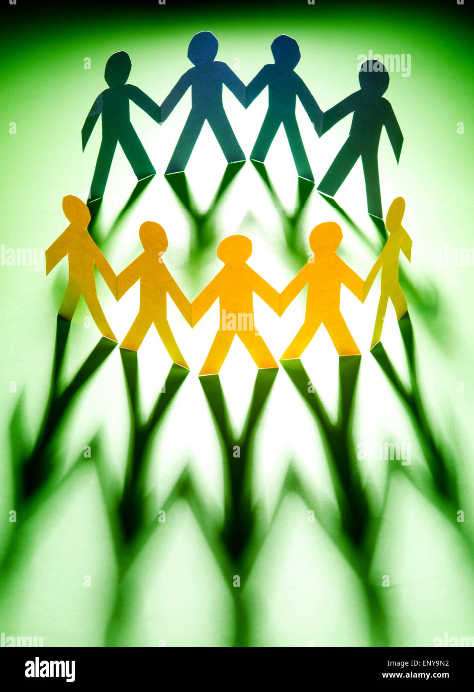 Paper people in teamworking concept Stock Photo - Alamy