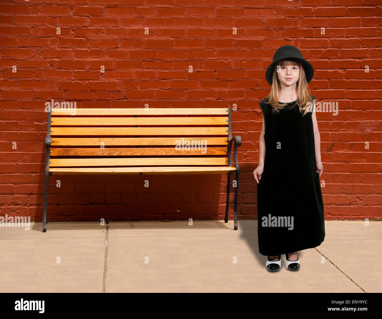 Girl Standing by Bench Stock Photo - Alamy