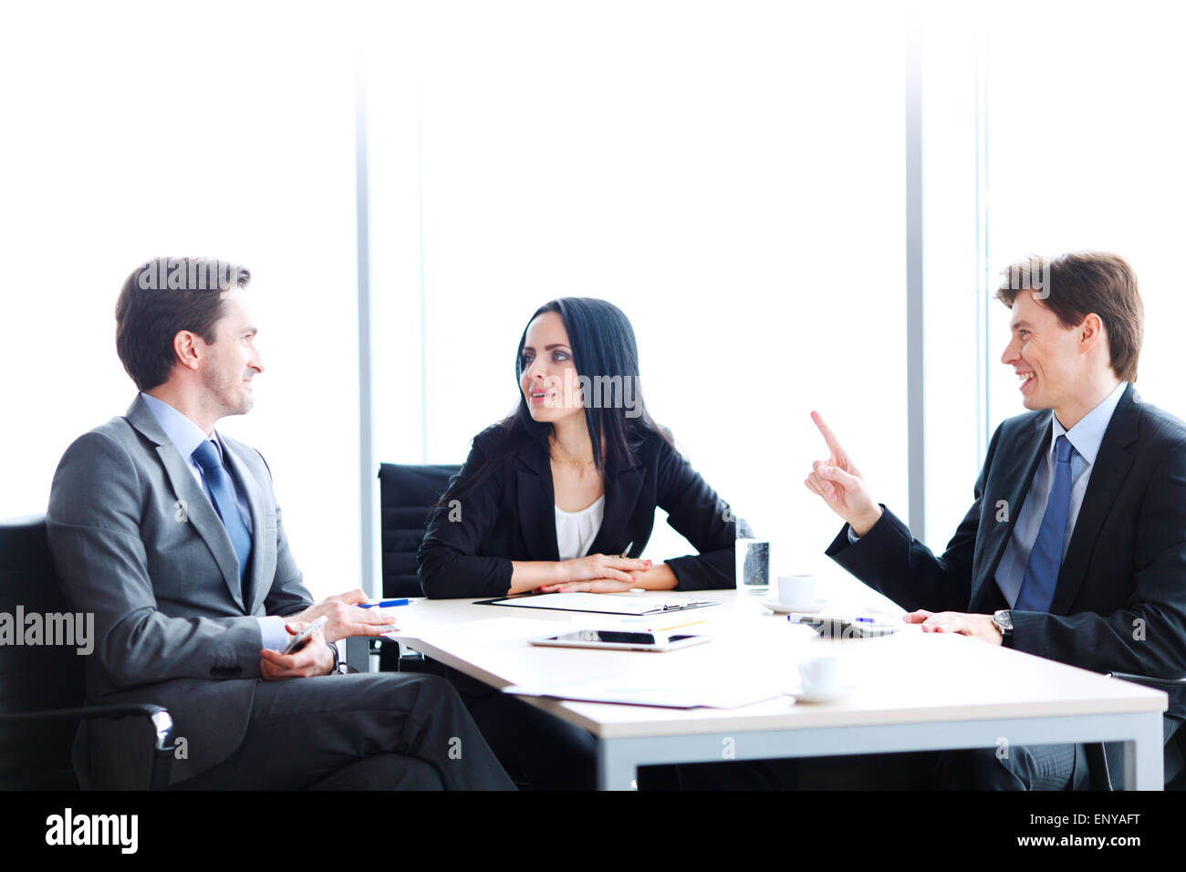 business people sitting at the office desk Stock Photo - Alamy