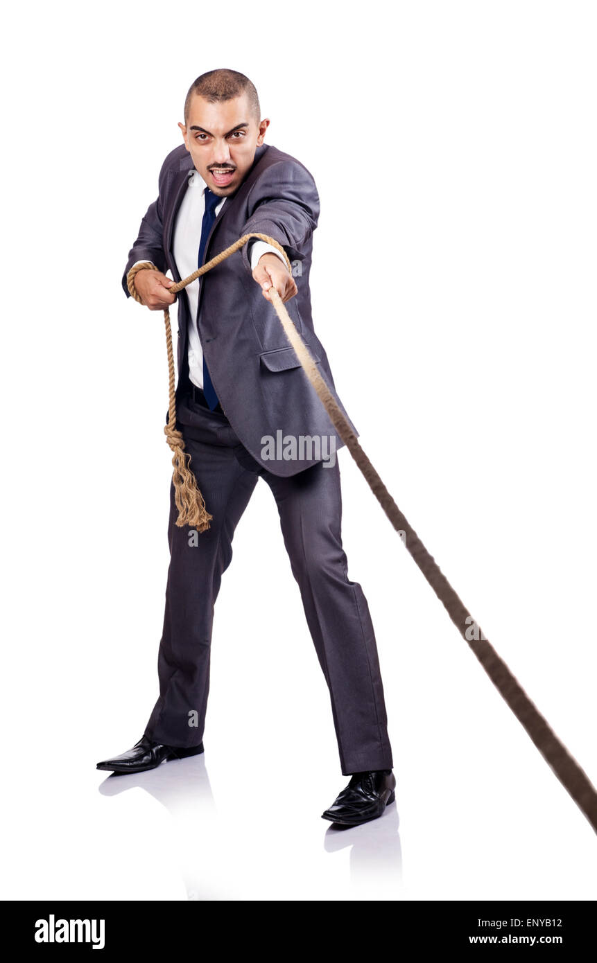 Man pulling the rope on white Stock Photo - Alamy
