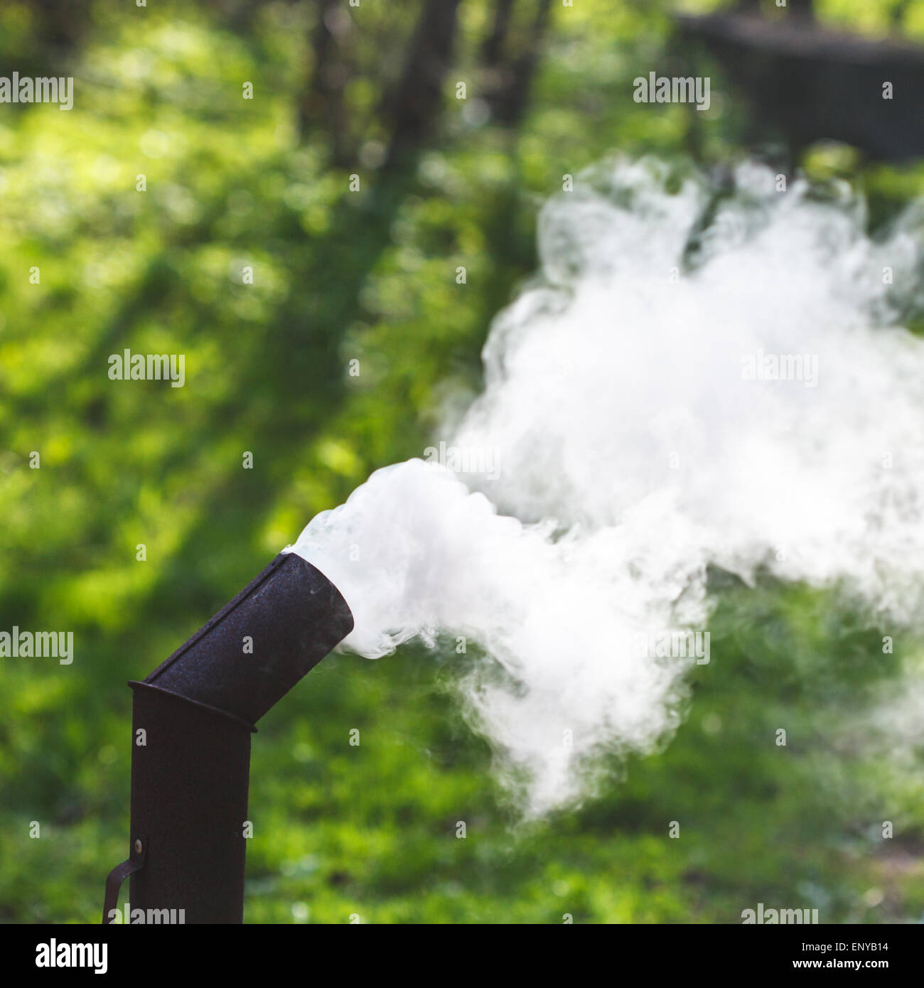 thick smoke from the pipe of a samovar outdoors Stock Photo - Alamy