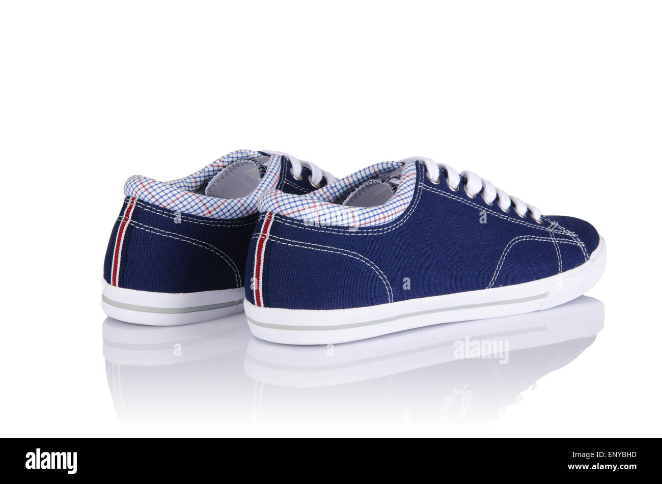 Sporty shoes in sport shoes concept on white Stock Photo - Alamy