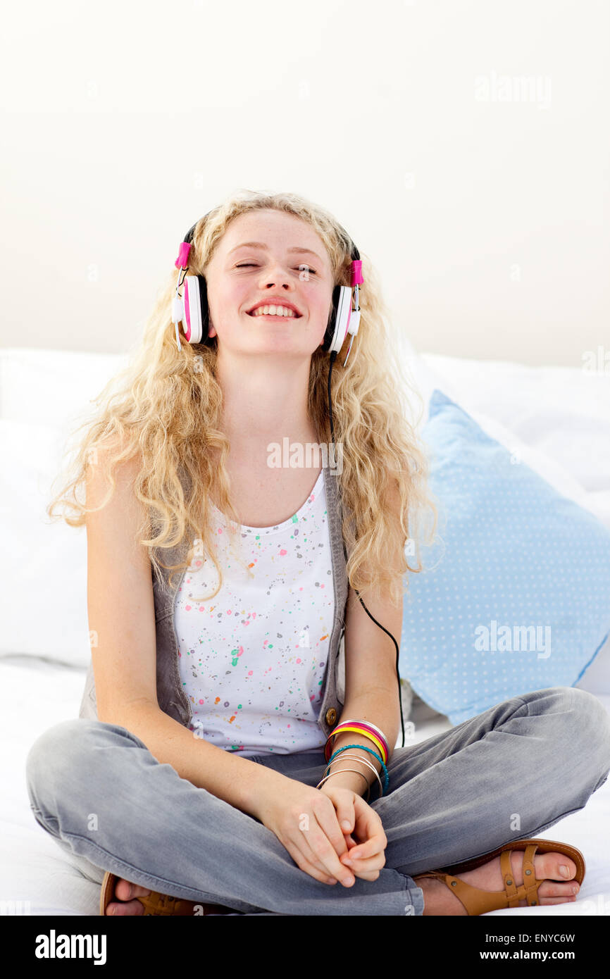 Beautiful teenager listening to the music Stock Photo - Alamy