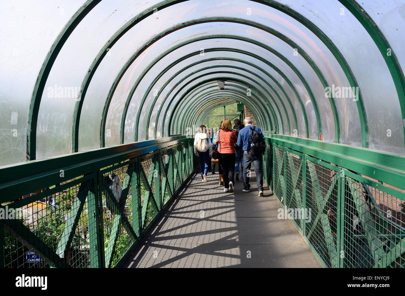A covered walkway on a footbridge at Windsor and Eton Central railway ...