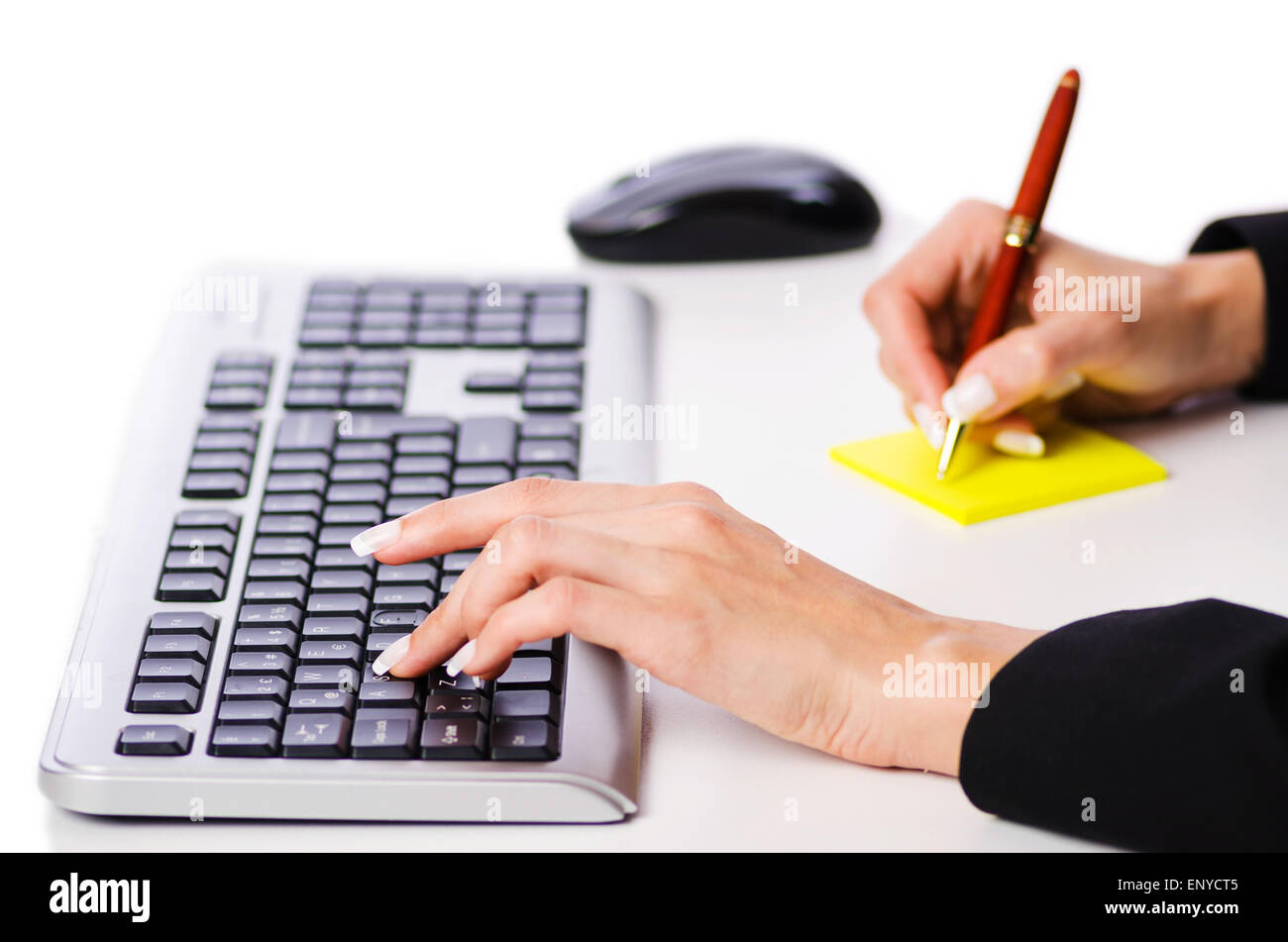 Hands working on the keyboard Stock Photo - Alamy