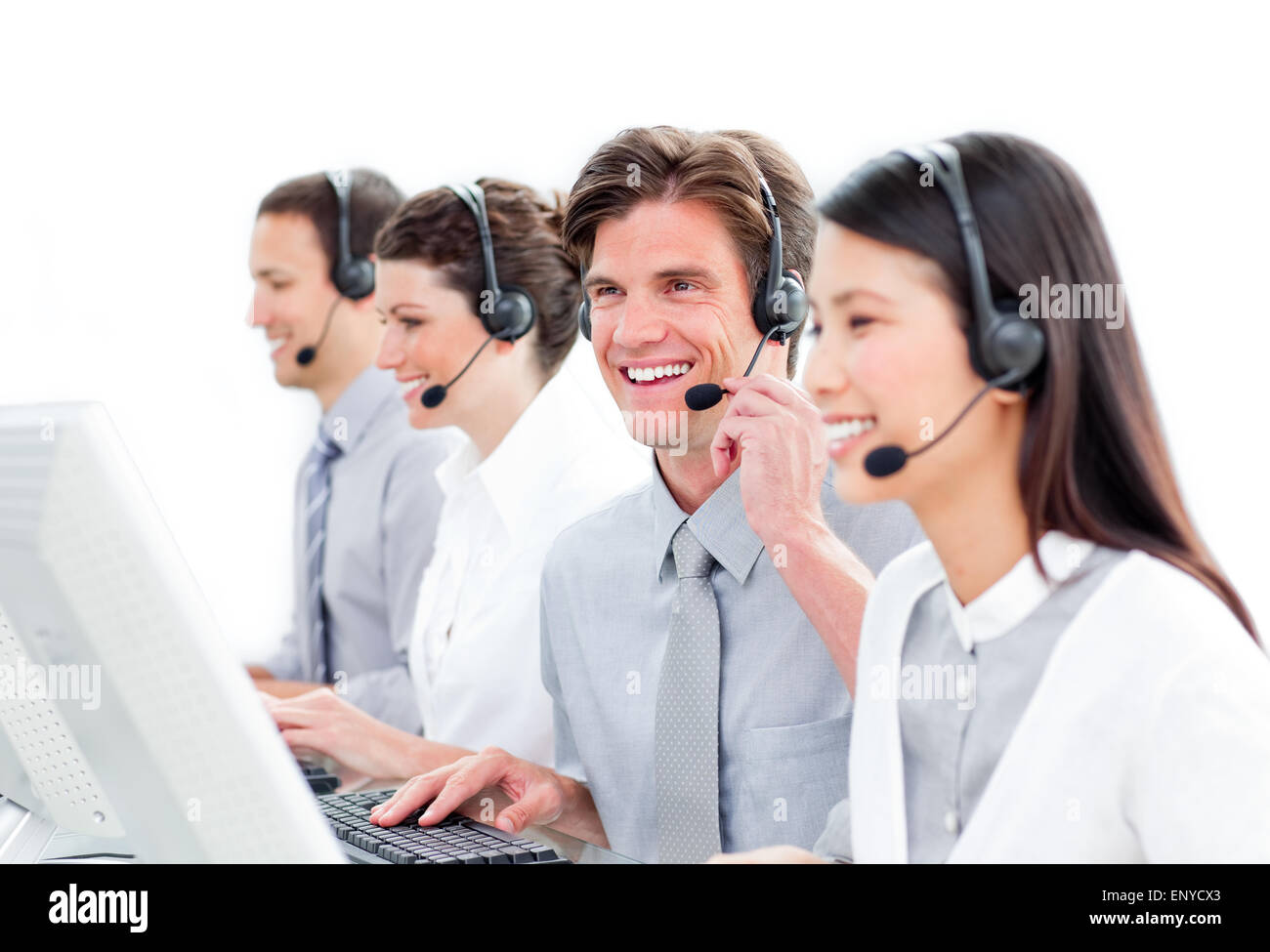 Portrait of charismatic customer service agents working in a call ...