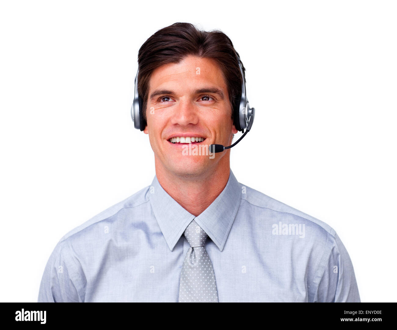 Charming customer service representative with headset on against a ...