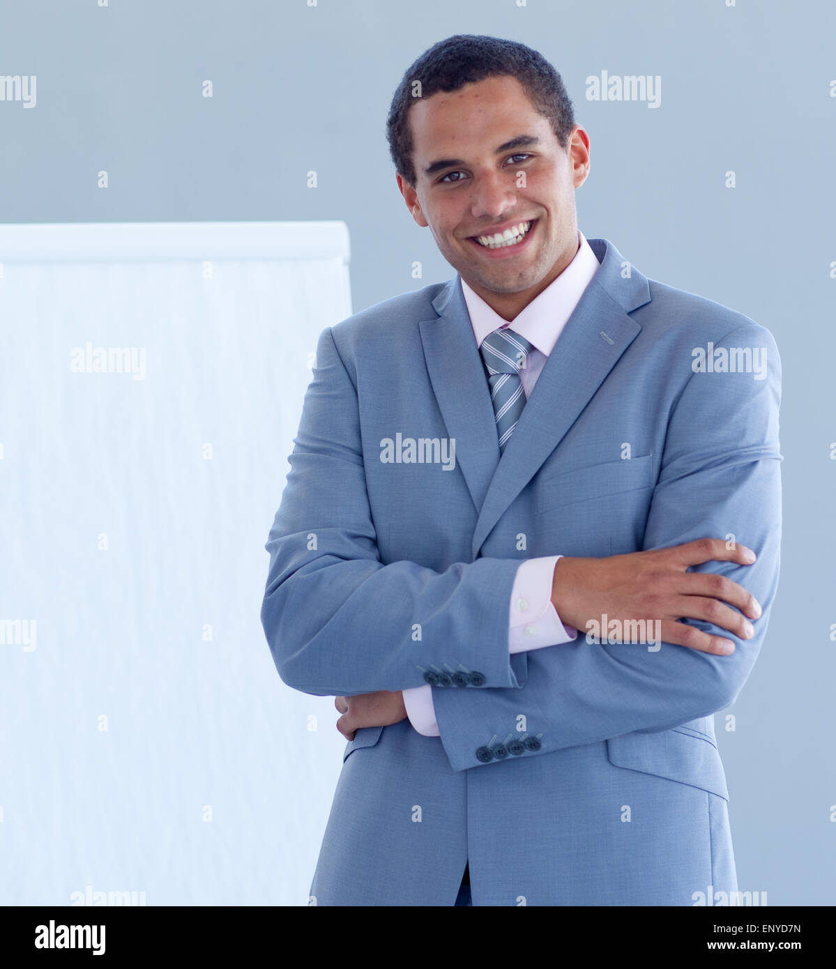 Smiling businessman giving a presentation Stock Photo - Alamy