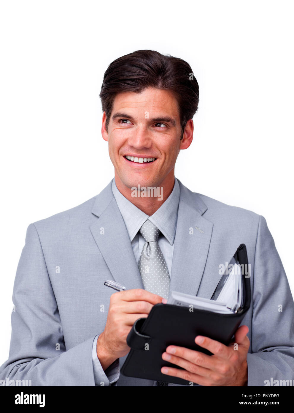 Attractive businessman holding an agenda Stock Photo - Alamy Attractive businessman holding an agenda Stock Photo - Alamy