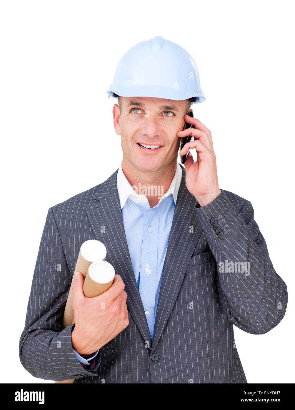 Smiling male engineer talking on phone isolated on a white background ...