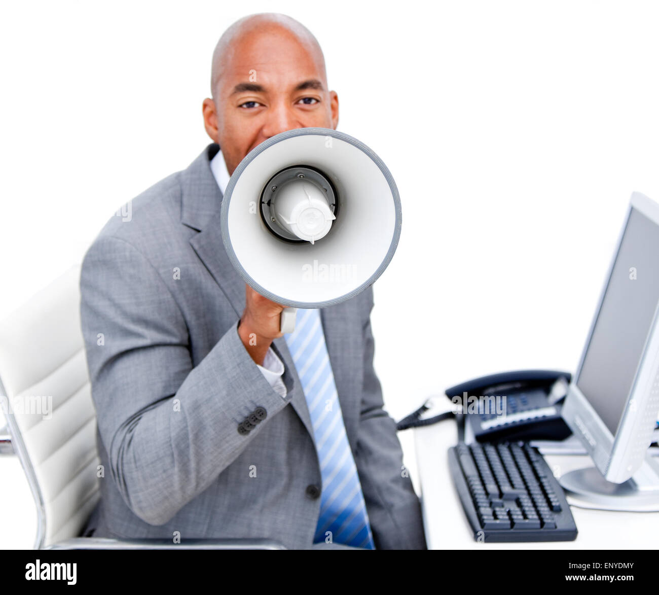 Stressed businessman yelling through a megaphone in the office Stock ...