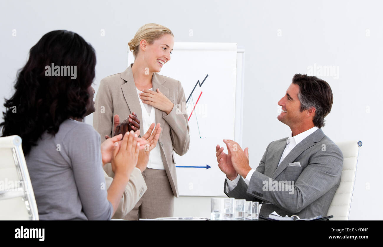 Smiling business people applauding a good presentation Stock Photo - Alamy
