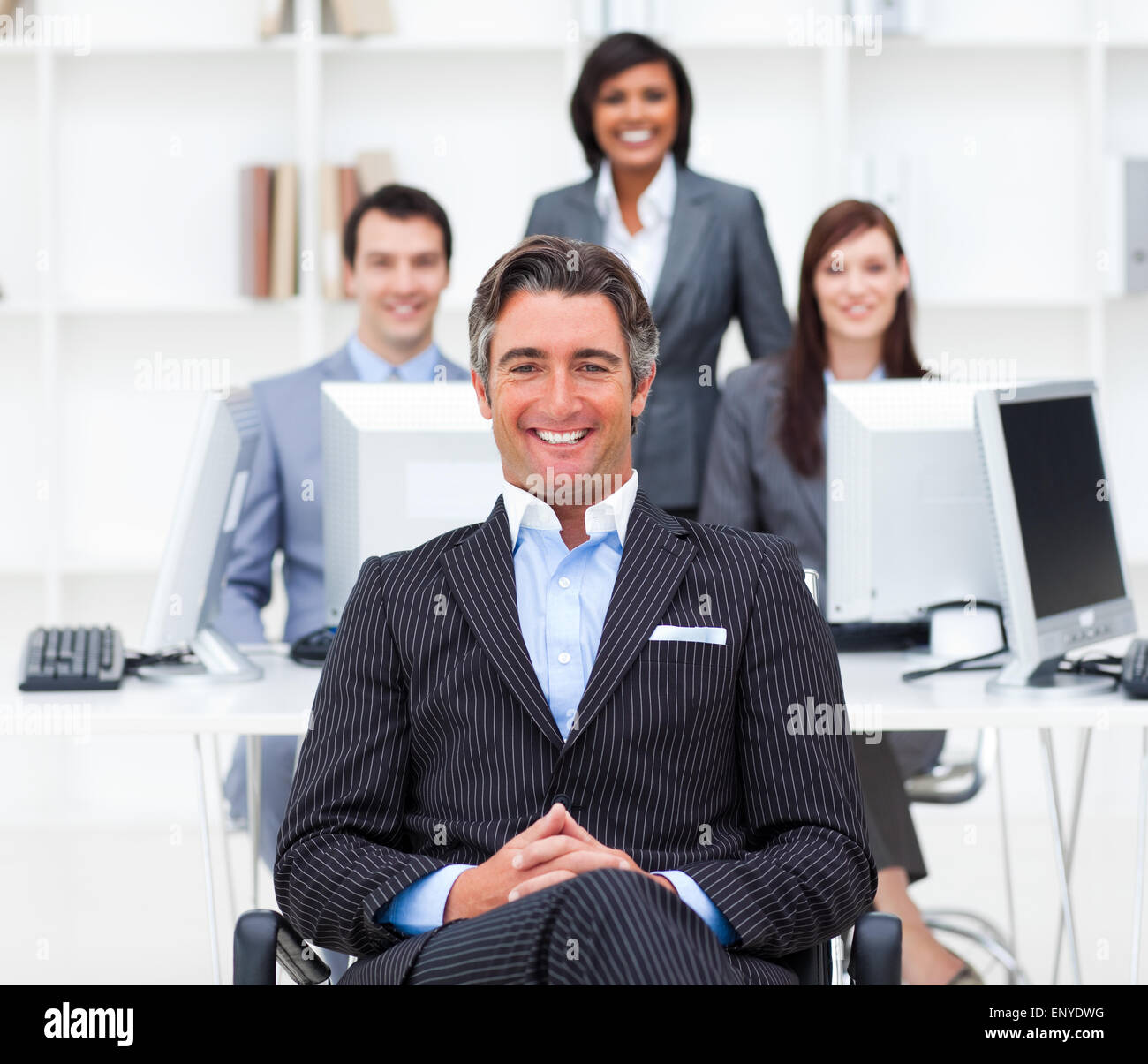 Presentation of a charismatic manager and his team Stock Photo - Alamy