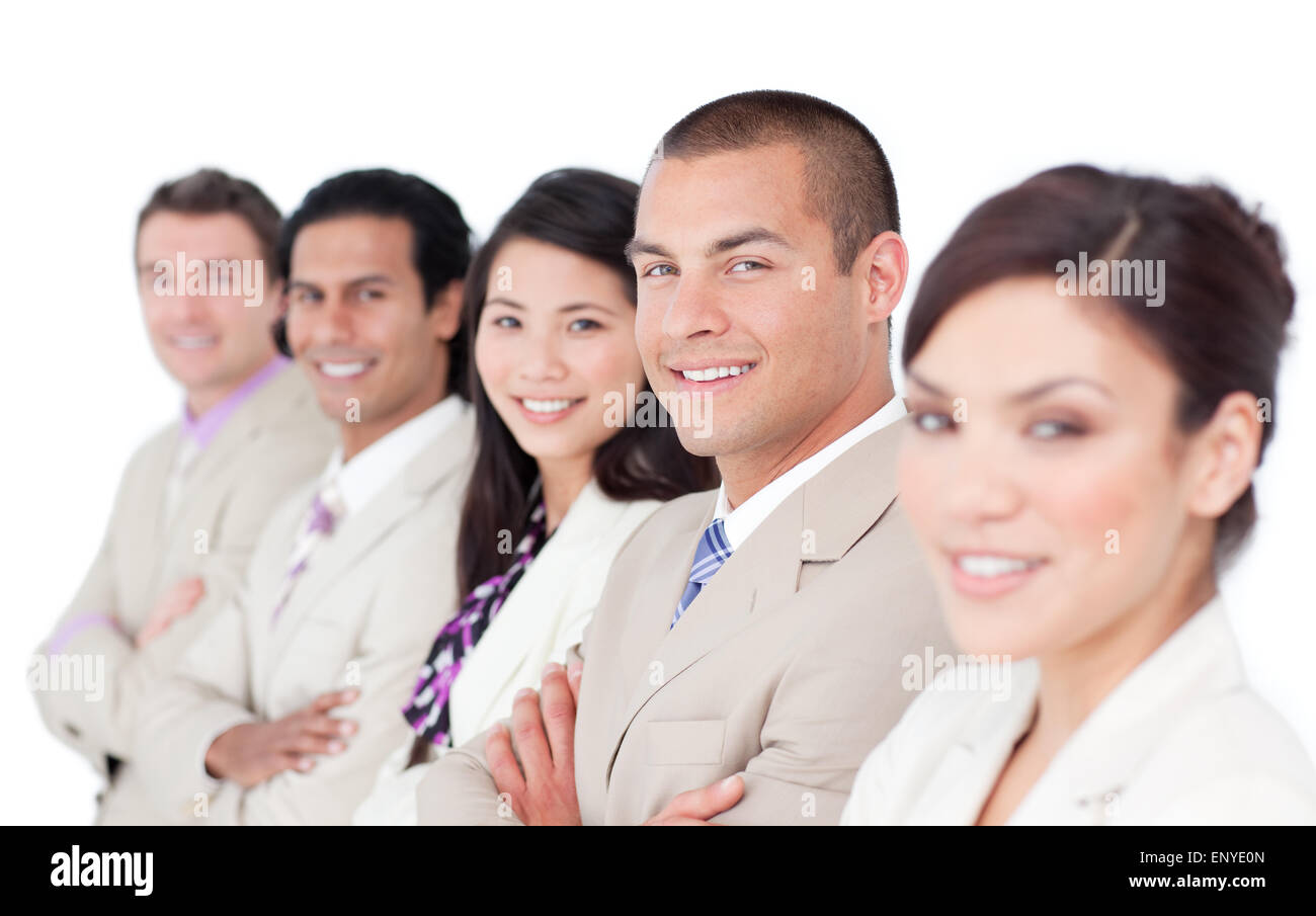 A diverse business team standing in a line against a white background ...