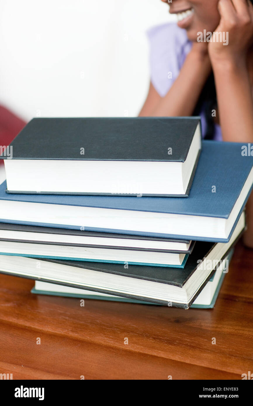 Stack of books on a table Stock Photo - Alamy
