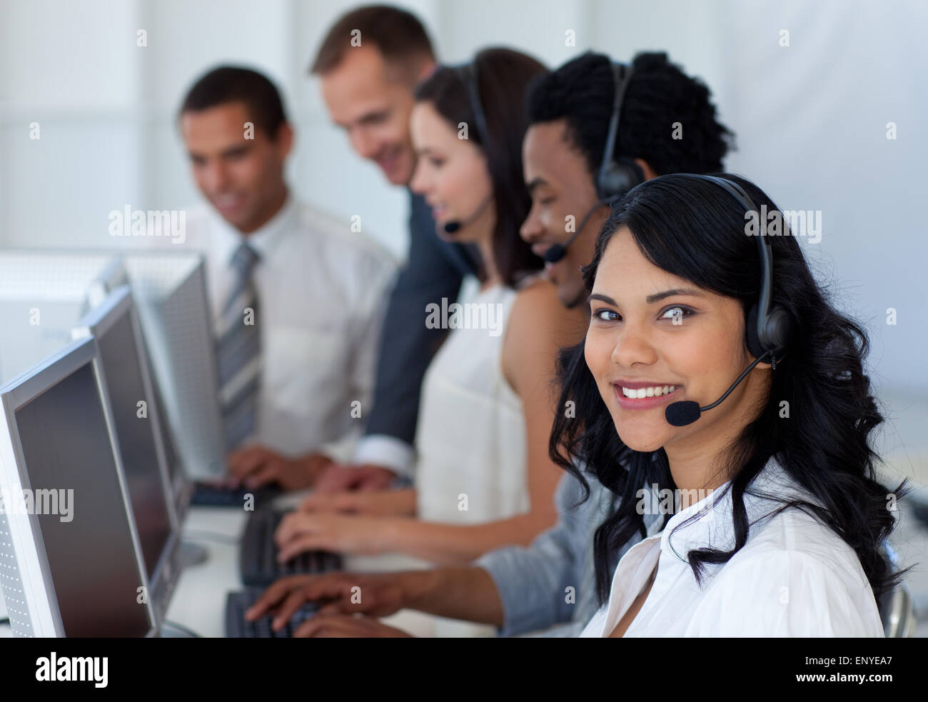 Business team working in a call center with a manager Stock Photo - Alamy