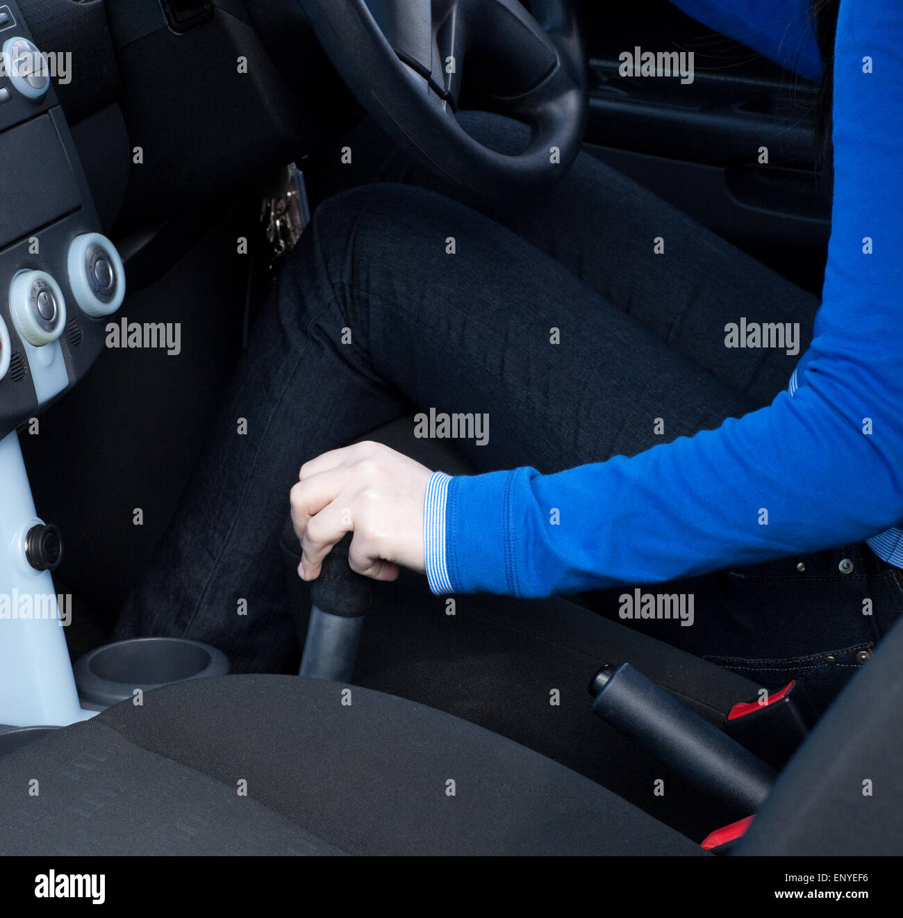 Close-up of woman changing gear Stock Photo - Alamy
