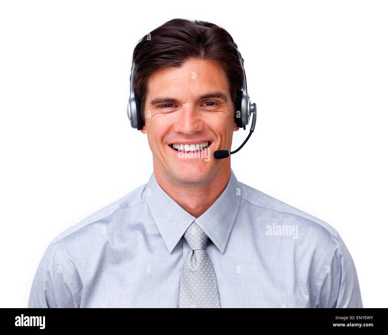 Happy customer service representative with headset on against a white ...