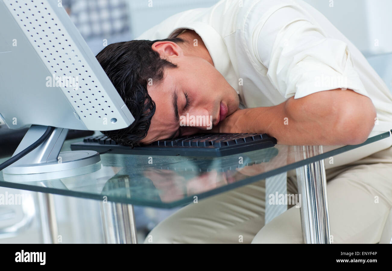 Tired businessman sleeping at his desk Stock Photo - Alamy