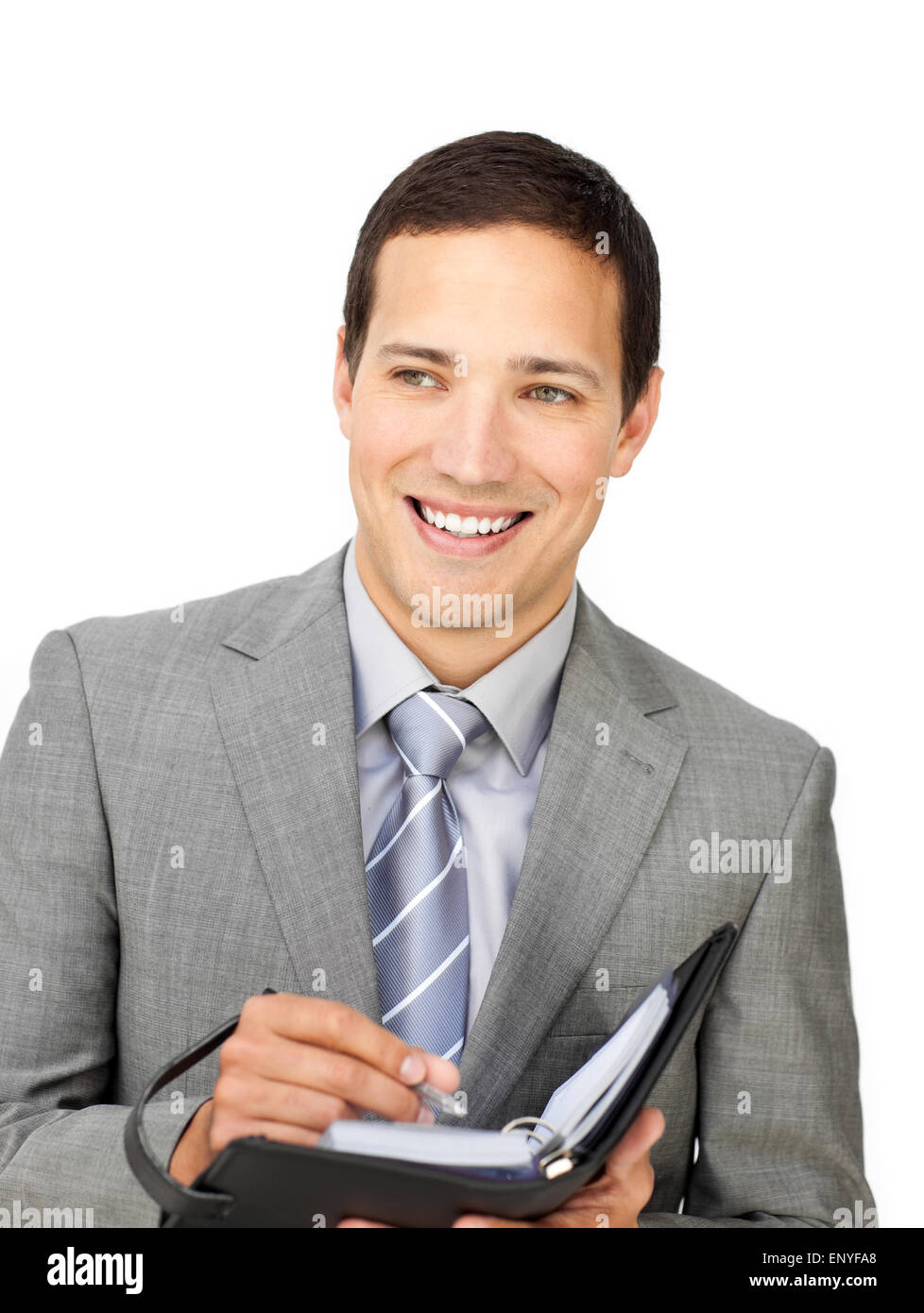 Attractive young businessman holding an agenda Stock Photo - Alamy Attractive young businessman holding an agenda Stock Photo - Alamy