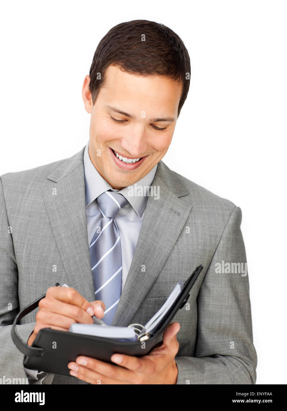 Confident businessman holding an agenda Stock Photo - Alamy Confident businessman holding an agenda Stock Photo - Alamy