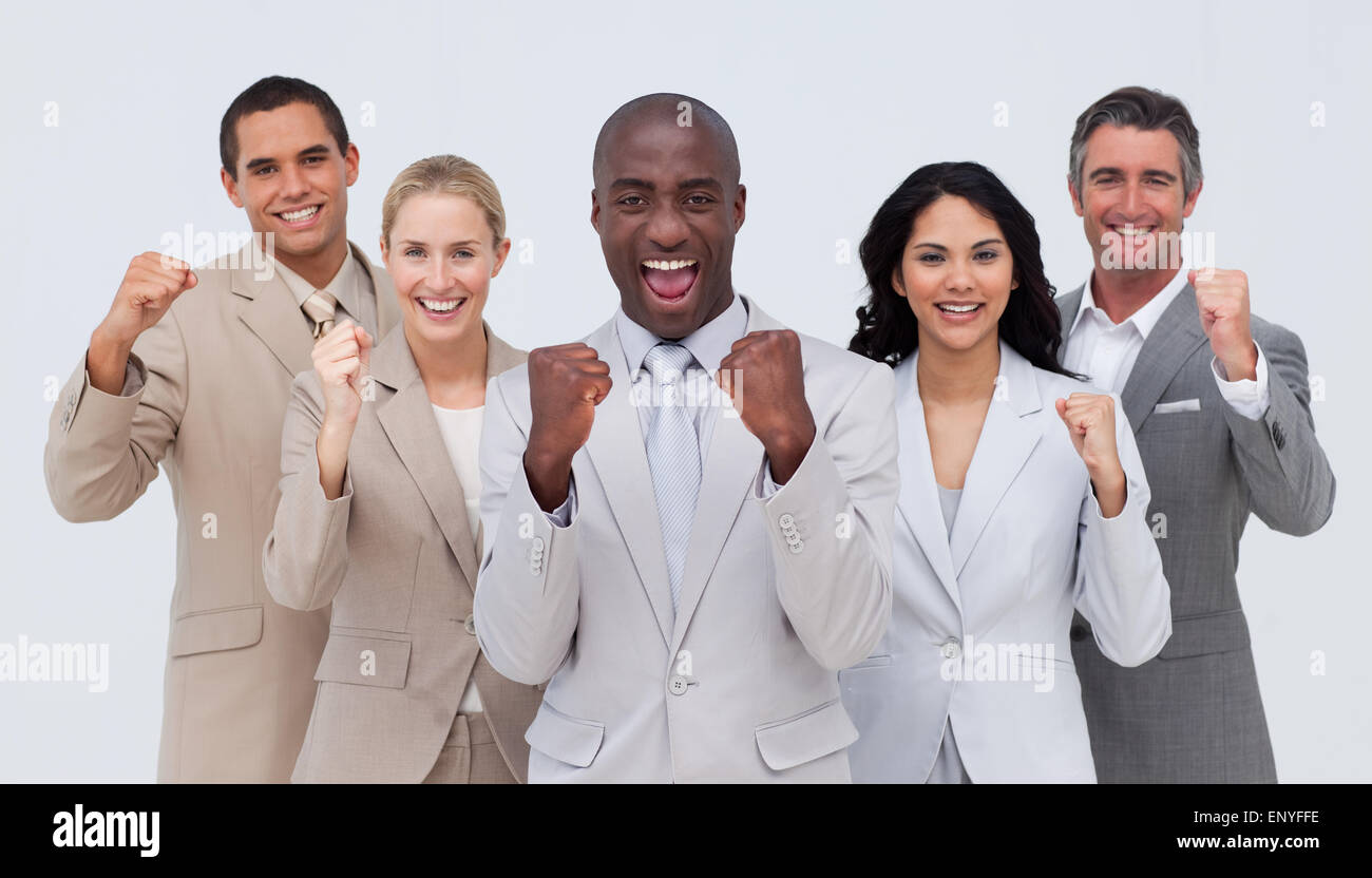 Happy and positive business team standing and smiling Stock Photo - Alamy