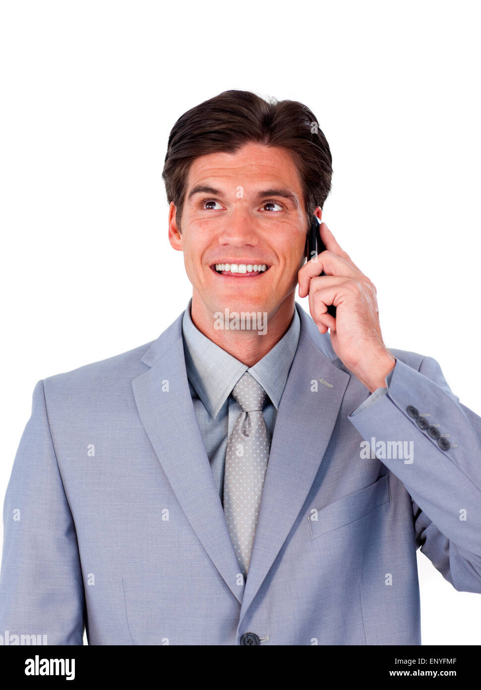 Confident businessman talking on phone Stock Photo - Alamy