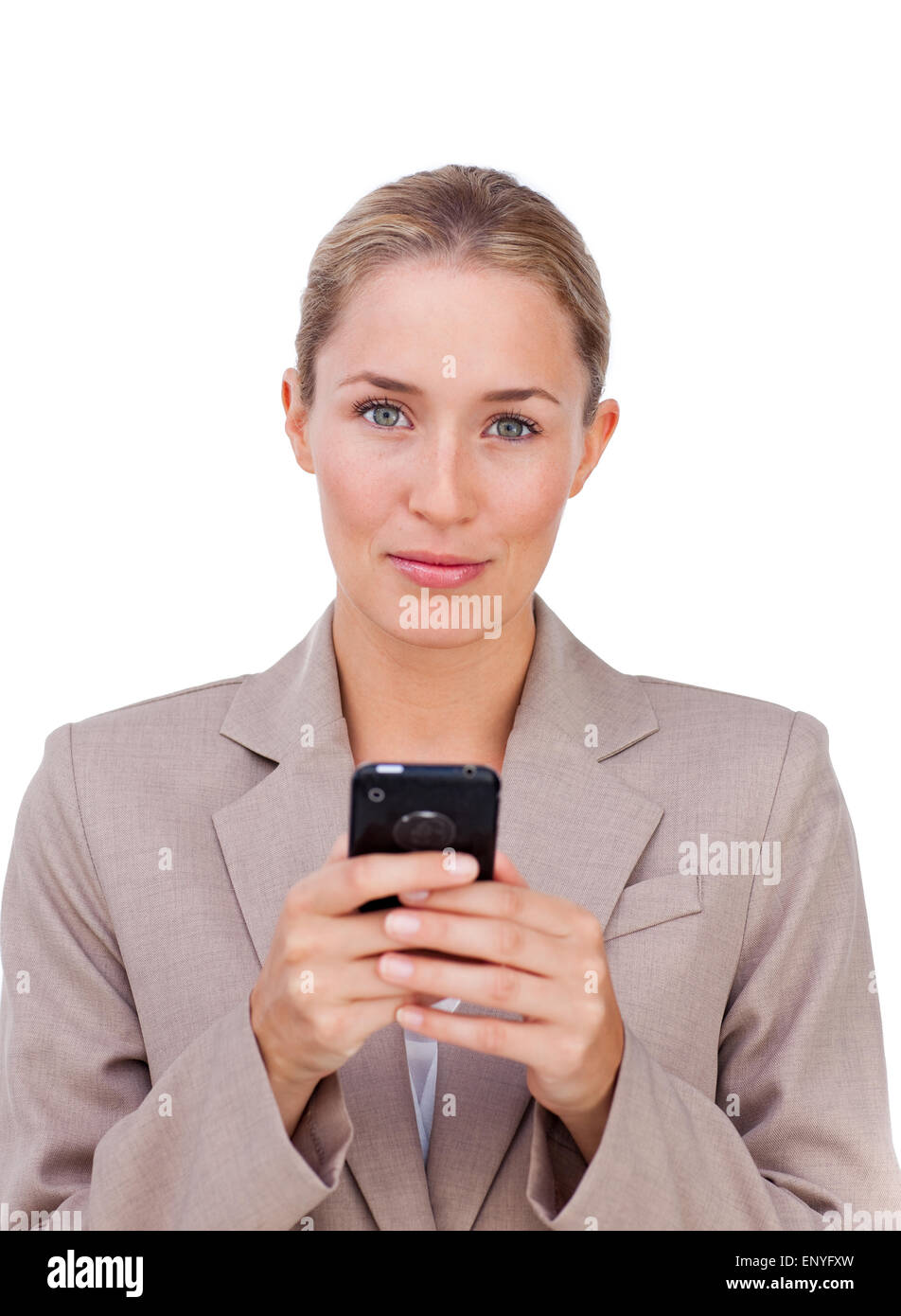 Blond businesswoman sending a text Stock Photo - Alamy