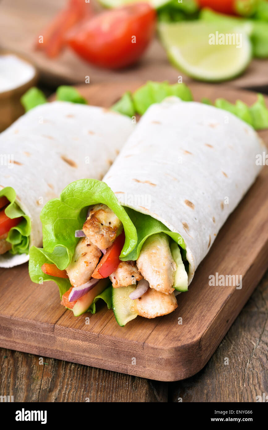 Chicken roll up wrap sandwich hi-res stock photography and images - Alamy