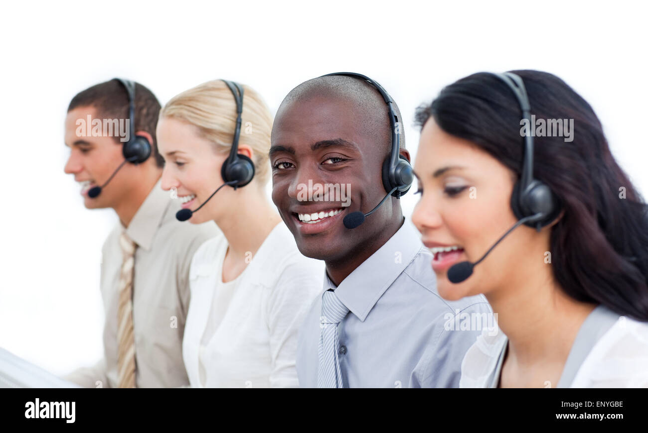 Competitive business people working in a call center in the office ...