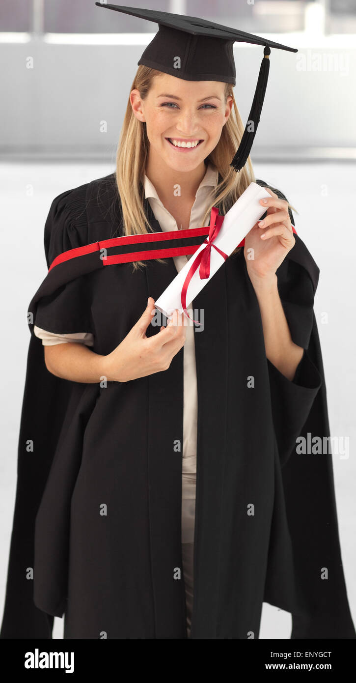 Woman smiling at her graduation Stock Photo - Alamy